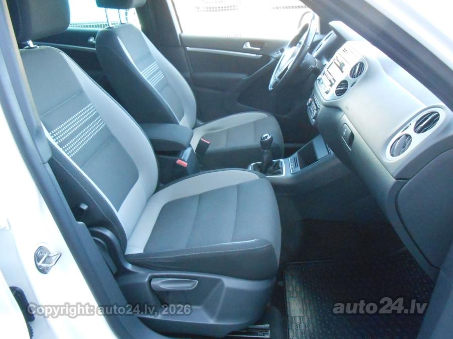 White Volkswagen Tiguan 2013 in Viljandi, with an engine capacity of 2.00 L and mileage of 226 thousand km for 8990 €, photo 12 on AUTOMOTO.COM.LV