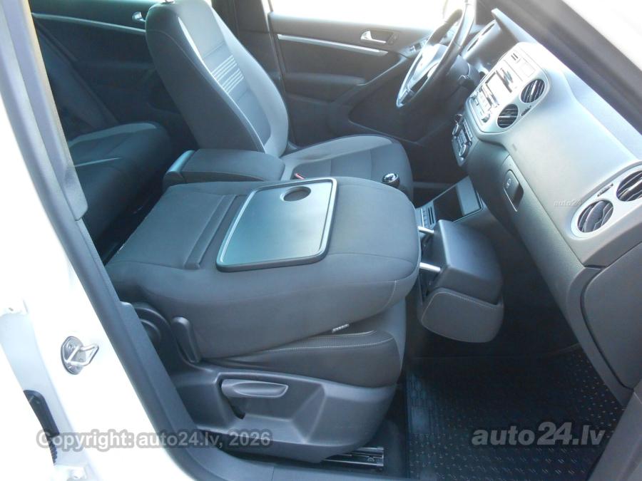 White Volkswagen Tiguan 2013 in Viljandi, with an engine capacity of 2.00 L and mileage of 226 thousand km for 8990 €, photo 13 on AUTOMOTO.COM.LV