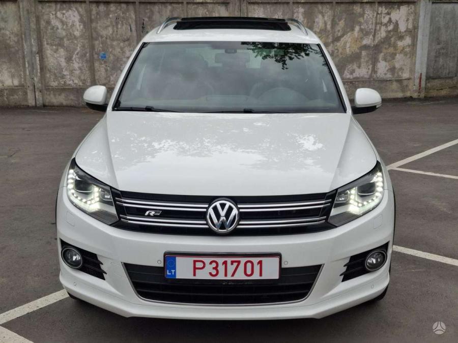 White Volkswagen Tiguan 2013 in Vilnius, with an engine capacity of 1.97 L and mileage of 244 thousand km for 9700 €, photo 9 on AUTOMOTO.COM.LV