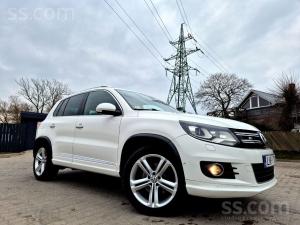 White Volkswagen Tiguan 2013 in Liepaja, with an engine capacity of 2.00 L and mileage of 256 thousand km for 9777 €, photo 7 on AUTOMOTO.COM.LV