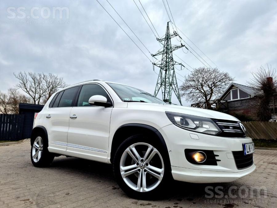 White Volkswagen Tiguan 2013 in Liepaja, with an engine capacity of 2.00 L and mileage of 256 thousand km for 9777 €, photo 7 on AUTOMOTO.COM.LV