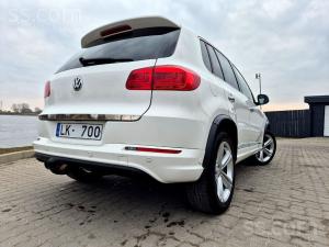White Volkswagen Tiguan 2013 in Liepaja, with an engine capacity of 2.00 L and mileage of 256 thousand km for 9777 €, photo 8 on AUTOMOTO.COM.LV