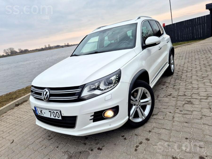 White Volkswagen Tiguan 2013 in Liepaja, with an engine capacity of 2.00 L and mileage of 256 thousand km for 9777 €, photo 11 on AUTOMOTO.COM.LV