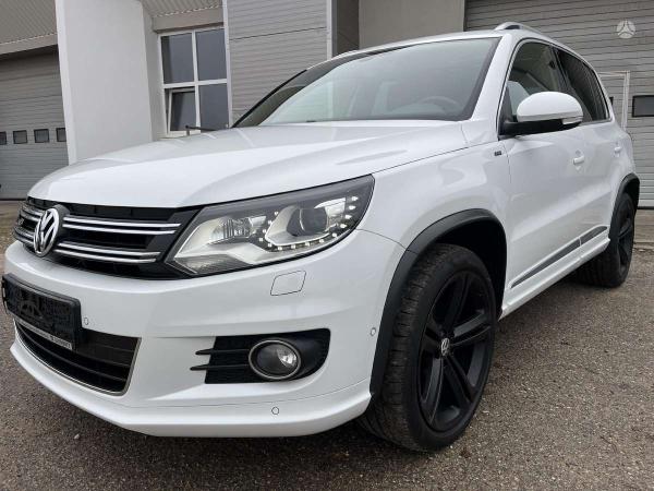 White Volkswagen Tiguan 2014 in Utena, with an engine capacity of 2.00 L and mileage of 246 thousand km for 11800 €, photo 1 on AUTOMOTO.COM.LV