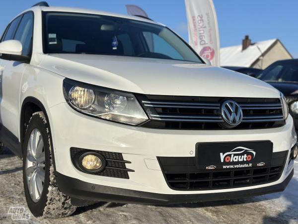 White Volkswagen Tiguan 2014 in Pabrade, with an engine capacity of 2.00 L and mileage of 275 thousand km for 7999 €, photo 8 on AUTOMOTO.COM.LV