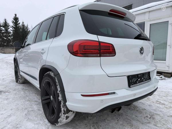 White Volkswagen Tiguan 2014 in Utena, with an engine capacity of 2.00 L and mileage of 251 thousand km for 10800 €, photo 3 on AUTOMOTO.COM.LV
