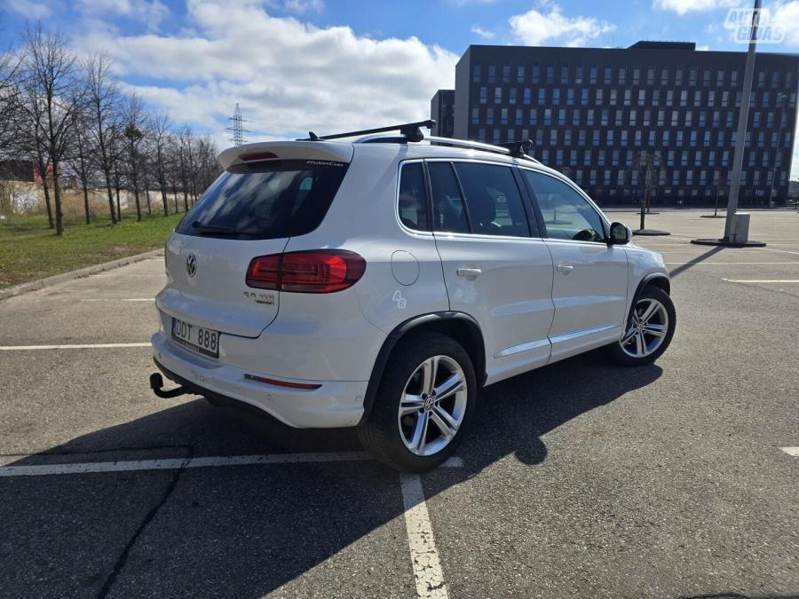 White Volkswagen Tiguan 2014 in Kaunas, with an engine capacity of 2.00 L and mileage of 370 thousand km for 8990 €, photo 3 on AUTOMOTO.COM.LV
