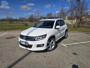 White Volkswagen Tiguan 2014 in Kaunas, with an engine capacity of 2.00 L and mileage of 370 thousand km for 8990 €, photo 6 on AUTOMOTO.COM.LV