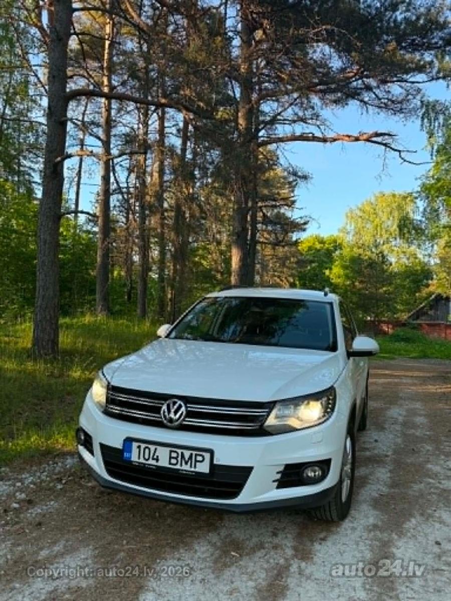 White Volkswagen Tiguan 2014 in Tallinn, with an engine capacity of 1.40 L and mileage of 165 thousand km for 9900 €, photo 4 on AUTOMOTO.COM.LV