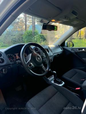 White Volkswagen Tiguan 2014 in Tallinn, with an engine capacity of 1.40 L and mileage of 165 thousand km for 9900 €, photo 7 on AUTOMOTO.COM.LV