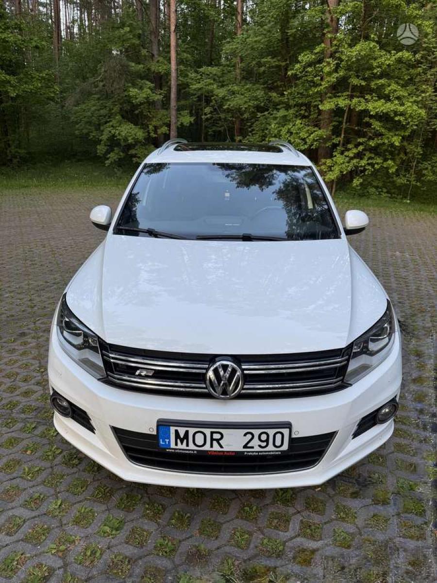 White Volkswagen Tiguan 2014 in Moletai, with an engine capacity of 1.97 L and mileage of 137 thousand km for 12700 €, photo 4 on AUTOMOTO.COM.LV