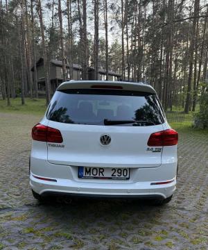 White Volkswagen Tiguan 2014 in Moletai, with an engine capacity of 1.97 L and mileage of 137 thousand km for 12700 €, photo 5 on AUTOMOTO.COM.LV