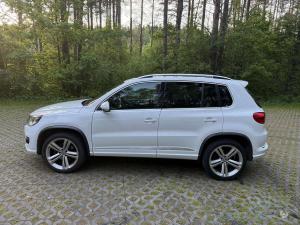 White Volkswagen Tiguan 2014 in Moletai, with an engine capacity of 1.97 L and mileage of 137 thousand km for 12700 €, photo 6 on AUTOMOTO.COM.LV