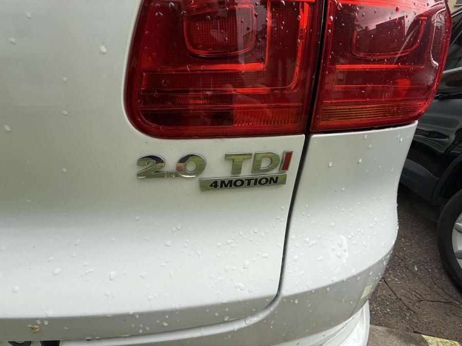 White Volkswagen Tiguan 2014 in Moletai, with an engine capacity of 1.97 L and mileage of 137 thousand km for 12700 €, photo 18 on AUTOMOTO.COM.LV