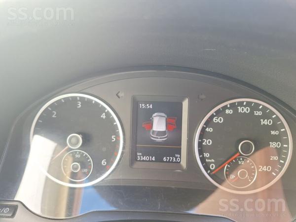 White Volkswagen Tiguan 2014 in Riga, with an engine capacity of 2.00 L and mileage of 334 thousand km for 10000 €, photo 1 on AUTOMOTO.COM.LV
