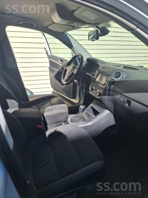 White Volkswagen Tiguan 2014 in Riga, with an engine capacity of 2.00 L and mileage of 334 thousand km for 10000 €, photo 2 on AUTOMOTO.COM.LV