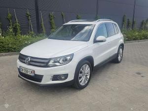 White Volkswagen Tiguan 2014 in Vilnius, with an engine capacity of 2.00 L and mileage of 241 thousand km for 8350 €, photo  on AUTOMOTO.COM.LV