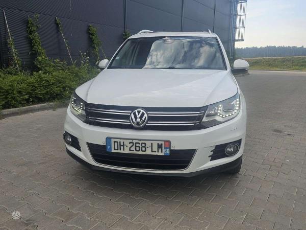 White Volkswagen Tiguan 2014 in Vilnius, with an engine capacity of 2.00 L and mileage of 241 thousand km for 8350 €, photo 2 on AUTOMOTO.COM.LV