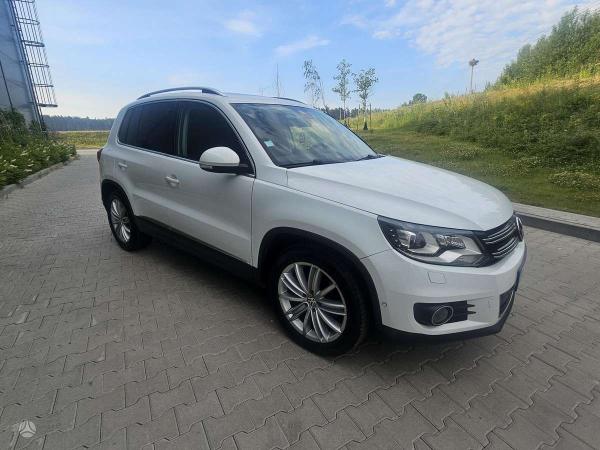 White Volkswagen Tiguan 2014 in Vilnius, with an engine capacity of 2.00 L and mileage of 241 thousand km for 8350 €, photo 8 on AUTOMOTO.COM.LV