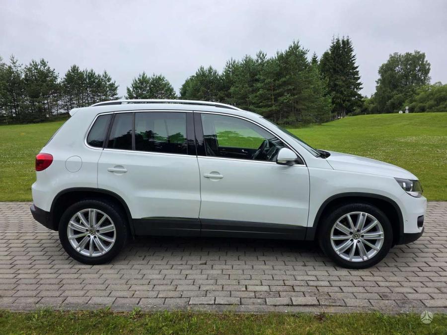 White Volkswagen Tiguan 2014 in Telschi, with an engine capacity of 1.39 L and mileage of 220 thousand km for 9200 €, photo 13 on AUTOMOTO.COM.LV