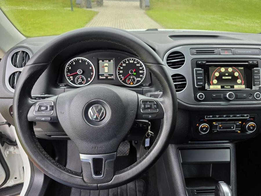 White Volkswagen Tiguan 2014 in Telschi, with an engine capacity of 1.39 L and mileage of 220 thousand km for 9200 €, photo 32 on AUTOMOTO.COM.LV