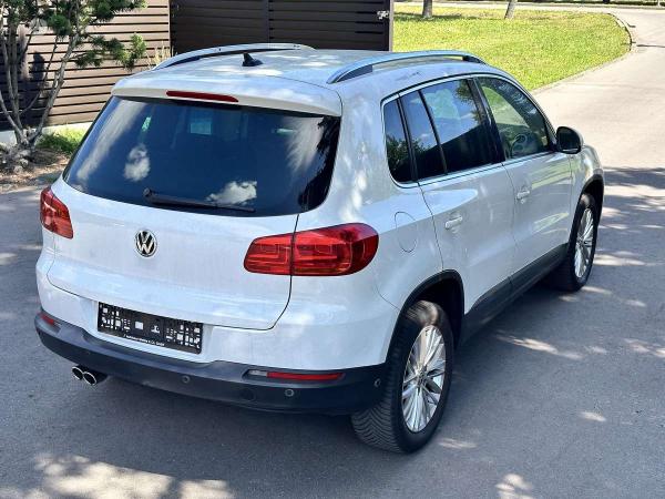 White Volkswagen Tiguan 2014 in Marijampole, with an engine capacity of 1.97 L and mileage of 136 thousand km for 8700 €, photo 3 on AUTOMOTO.COM.LV