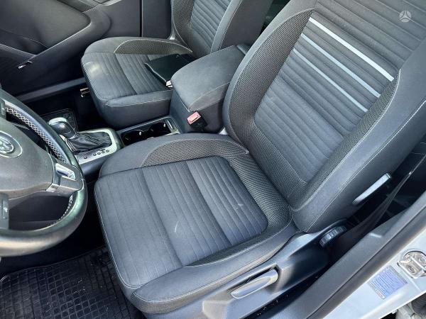White Volkswagen Tiguan 2014 in Marijampole, with an engine capacity of 1.97 L and mileage of 136 thousand km for 8700 €, photo 7 on AUTOMOTO.COM.LV