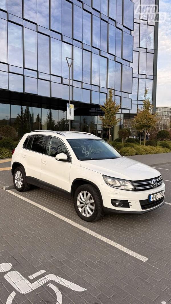 Volkswagen Tiguan 2014 in Vilnius on AUTOMOTO.COM.LV White Volkswagen Tiguan 2014 in Vilnius, with an engine capacity of 2.00 L and mileage of 207 thousand km for 9800 €, photo 1 on AUTOMOTO.COM.LV