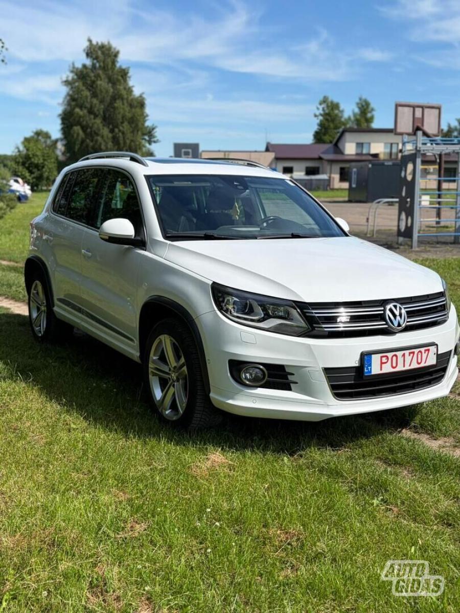 White Volkswagen Tiguan 2015 in Panevezys, with an engine capacity of 1.40 L and mileage of 267 thousand km for 8150 €, photo 3 on AUTOMOTO.COM.LV