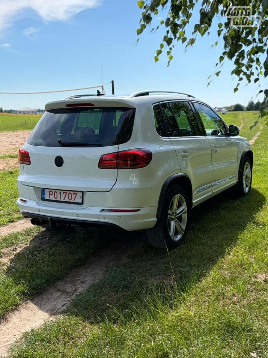White Volkswagen Tiguan 2015 in Panevezys, with an engine capacity of 1.40 L and mileage of 267 thousand km for 8150 €, photo 5 on AUTOMOTO.COM.LV