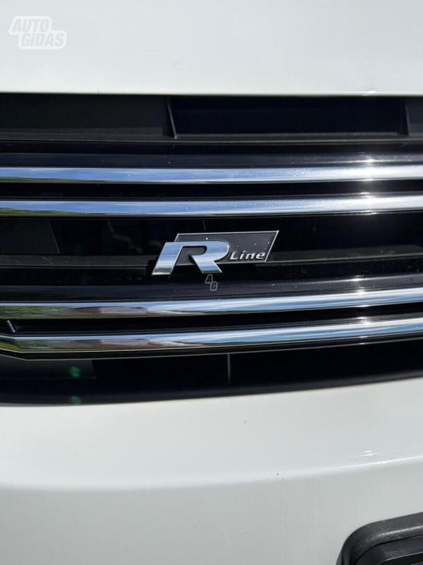 White Volkswagen Tiguan 2015 in Panevezys, with an engine capacity of 1.40 L and mileage of 267 thousand km for 7700 €, photo 5 on AUTOMOTO.COM.LV