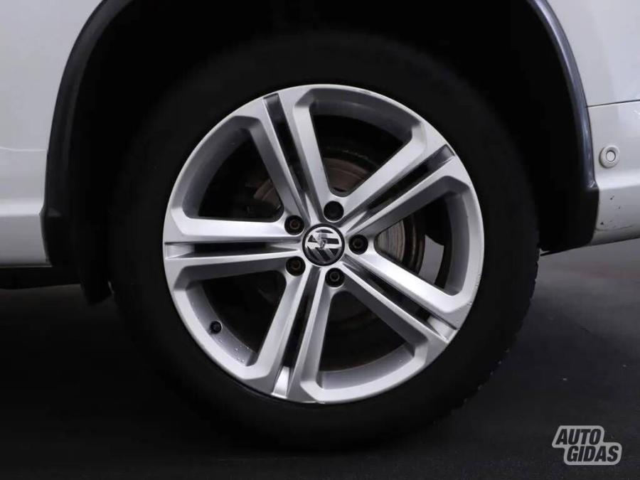 White Volkswagen Tiguan 2015 in Panevezys, with an engine capacity of 1.40 L and mileage of 267 thousand km for 8150 €, photo 8 on AUTOMOTO.COM.LV