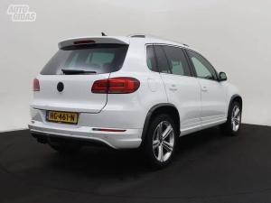 White Volkswagen Tiguan 2015 in Panevezys, with an engine capacity of 1.40 L and mileage of 267 thousand km for 8150 €, photo 9 on AUTOMOTO.COM.LV