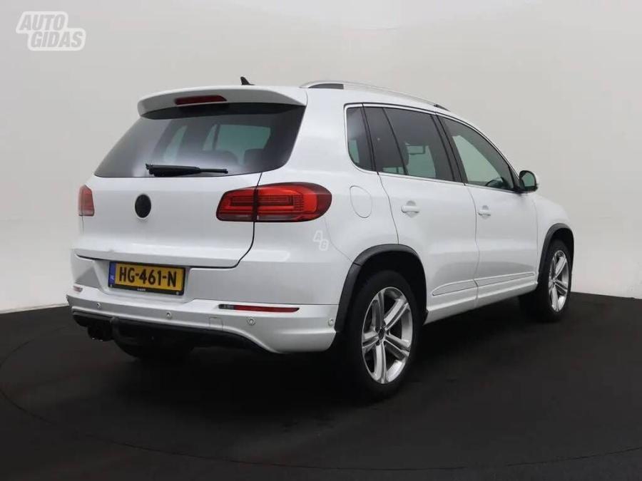 White Volkswagen Tiguan 2015 in Panevezys, with an engine capacity of 1.40 L and mileage of 267 thousand km for 8150 €, photo 9 on AUTOMOTO.COM.LV