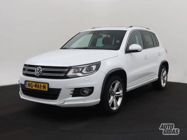 White Volkswagen Tiguan 2015 in Panevezys, with an engine capacity of 1.40 L and mileage of 267 thousand km for 7700 €, photo 9 on AUTOMOTO.COM.LV