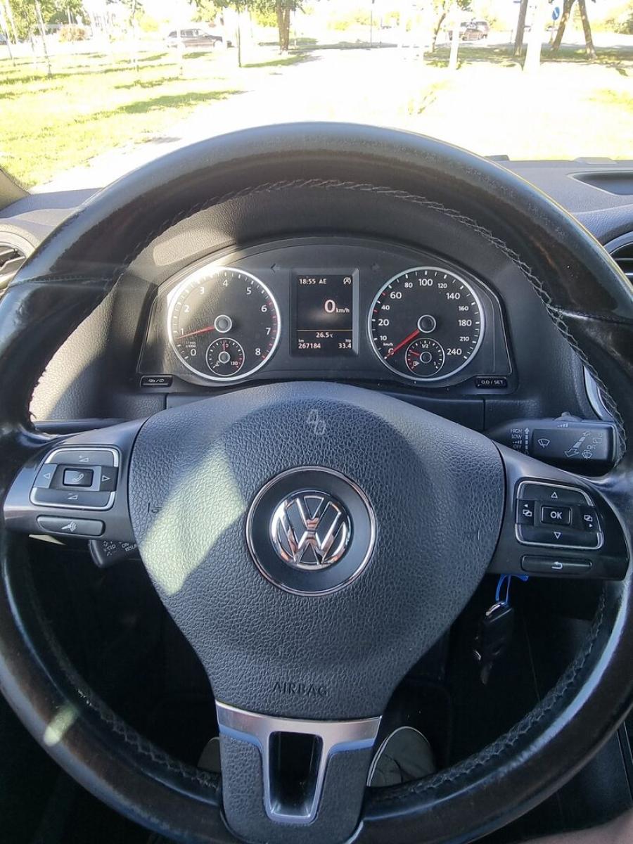 White Volkswagen Tiguan 2015 in Panevezys, with an engine capacity of 1.40 L and mileage of 267 thousand km for 8150 €, photo 12 on AUTOMOTO.COM.LV