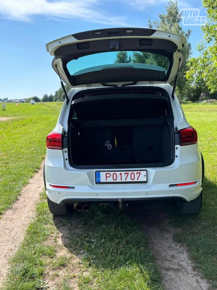 White Volkswagen Tiguan 2015 in Panevezys, with an engine capacity of 1.40 L and mileage of 267 thousand km for 8150 €, photo 31 on AUTOMOTO.COM.LV