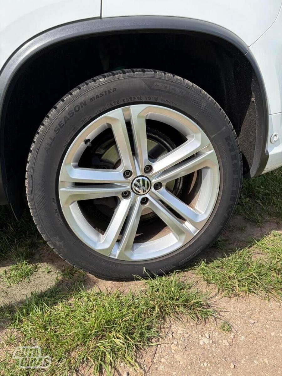 White Volkswagen Tiguan 2015 in Panevezys, with an engine capacity of 1.40 L and mileage of 267 thousand km for 8150 €, photo 33 on AUTOMOTO.COM.LV