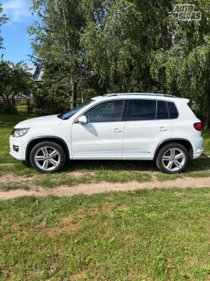 White Volkswagen Tiguan 2015 in Panevezys, with an engine capacity of 1.40 L and mileage of 267 thousand km for 8150 €, photo 34 on AUTOMOTO.COM.LV