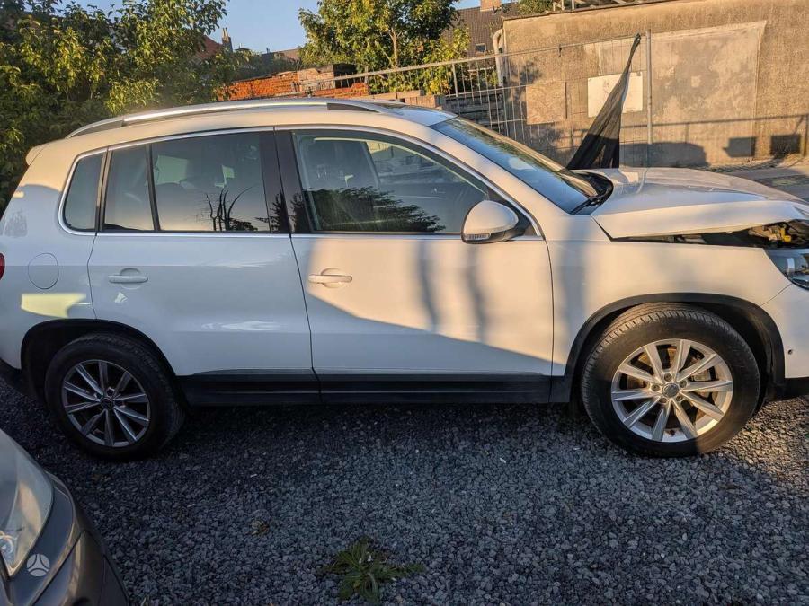 White Volkswagen Tiguan 2015 in Utena, with an engine capacity of 1.97 L and mileage of 150 thousand km for 8200 €, photo 15 on AUTOMOTO.COM.LV