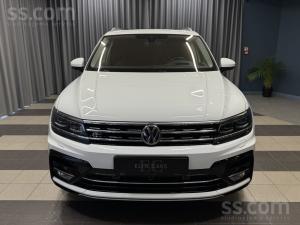 White Volkswagen Tiguan 2016 in Riga, with an engine capacity of 2.00 L and mileage of 223 thousand km for 17990 €, photo 2 on AUTOMOTO.COM.LV