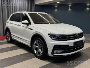 White Volkswagen Tiguan 2016 in Riga, with an engine capacity of 2.00 L and mileage of 223 thousand km for 17990 €, photo 3 on AUTOMOTO.COM.LV