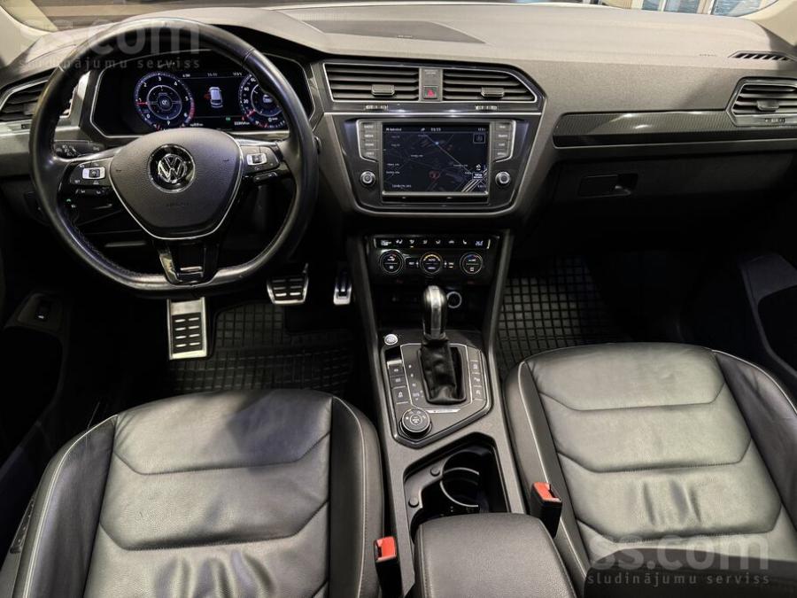 White Volkswagen Tiguan 2016 in Riga, with an engine capacity of 2.00 L and mileage of 223 thousand km for 17990 €, photo 10 on AUTOMOTO.COM.LV