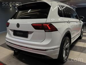 White Volkswagen Tiguan 2016 in Riga, with an engine capacity of 2.00 L and mileage of 223 thousand km for 17990 €, photo 26 on AUTOMOTO.COM.LV