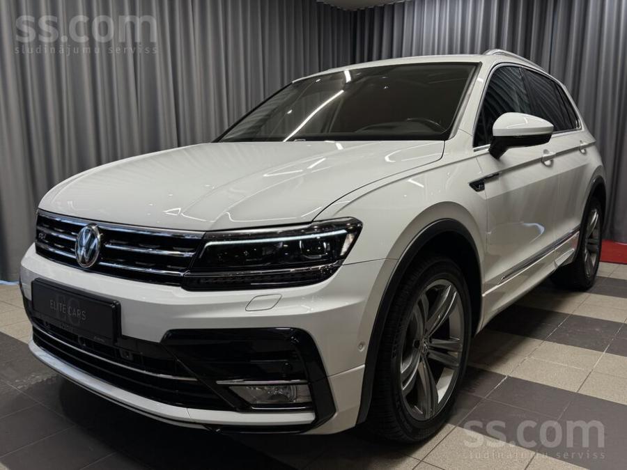 White Volkswagen Tiguan 2016 in Riga, with an engine capacity of 2.00 L and mileage of 223 thousand km for 17990 €, photo 27 on AUTOMOTO.COM.LV