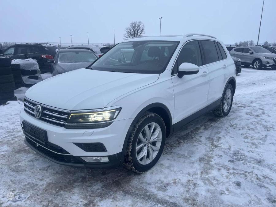 White Volkswagen Tiguan 2016 in Marijampole, with an engine capacity of 1.97 L and mileage of 297 thousand km for 15400 €, photo 1 on AUTOMOTO.COM.LV