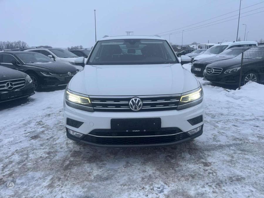 White Volkswagen Tiguan 2016 in Marijampole, with an engine capacity of 1.97 L and mileage of 297 thousand km for 15400 €, photo 2 on AUTOMOTO.COM.LV