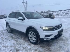 White Volkswagen Tiguan 2016 in Marijampole, with an engine capacity of 1.97 L and mileage of 297 thousand km for 15400 €, photo 3 on AUTOMOTO.COM.LV