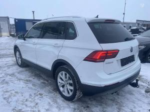 White Volkswagen Tiguan 2016 in Marijampole, with an engine capacity of 1.97 L and mileage of 297 thousand km for 15400 €, photo 6 on AUTOMOTO.COM.LV