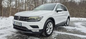 White Volkswagen Tiguan 2016 in Taurage, with an engine capacity of 1.97 L and mileage of 300 thousand km for 13800 €, photo 2 on AUTOMOTO.COM.LV